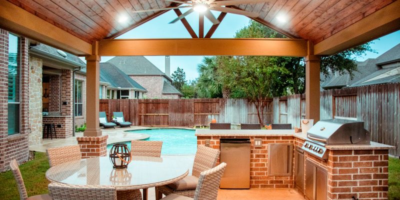 Gable Patio Cover with Outdoor Kitchen and Fire pit - HHI Patio Covers