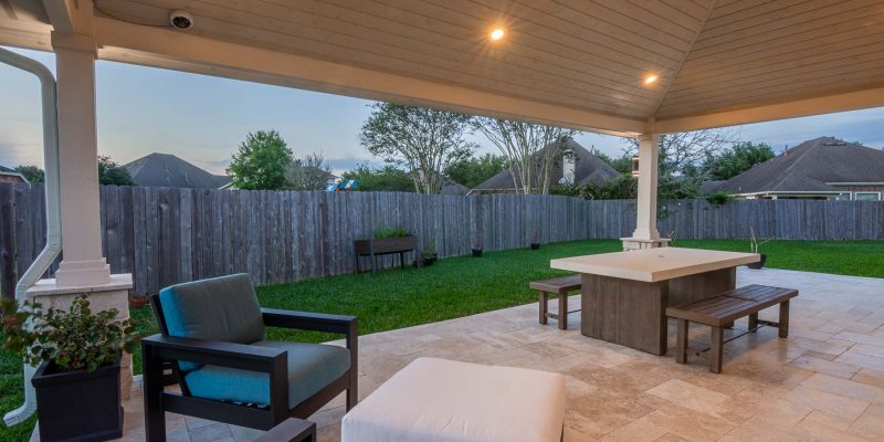 L Shaped Hip Style Patio Cover with Travertine Floor - HHI Patio Covers