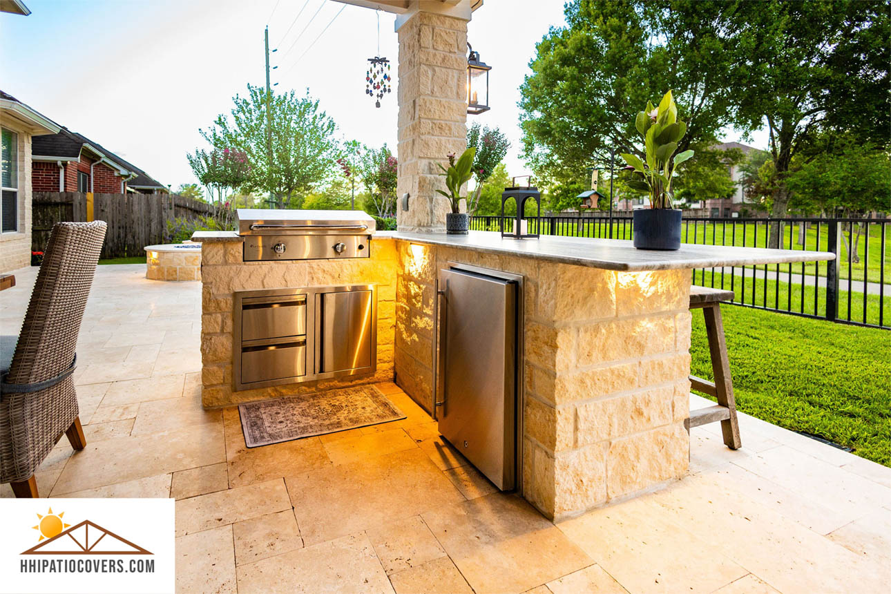 Covered Outdoor Kitchen With Fireplace Houston | HHI Patio Covers